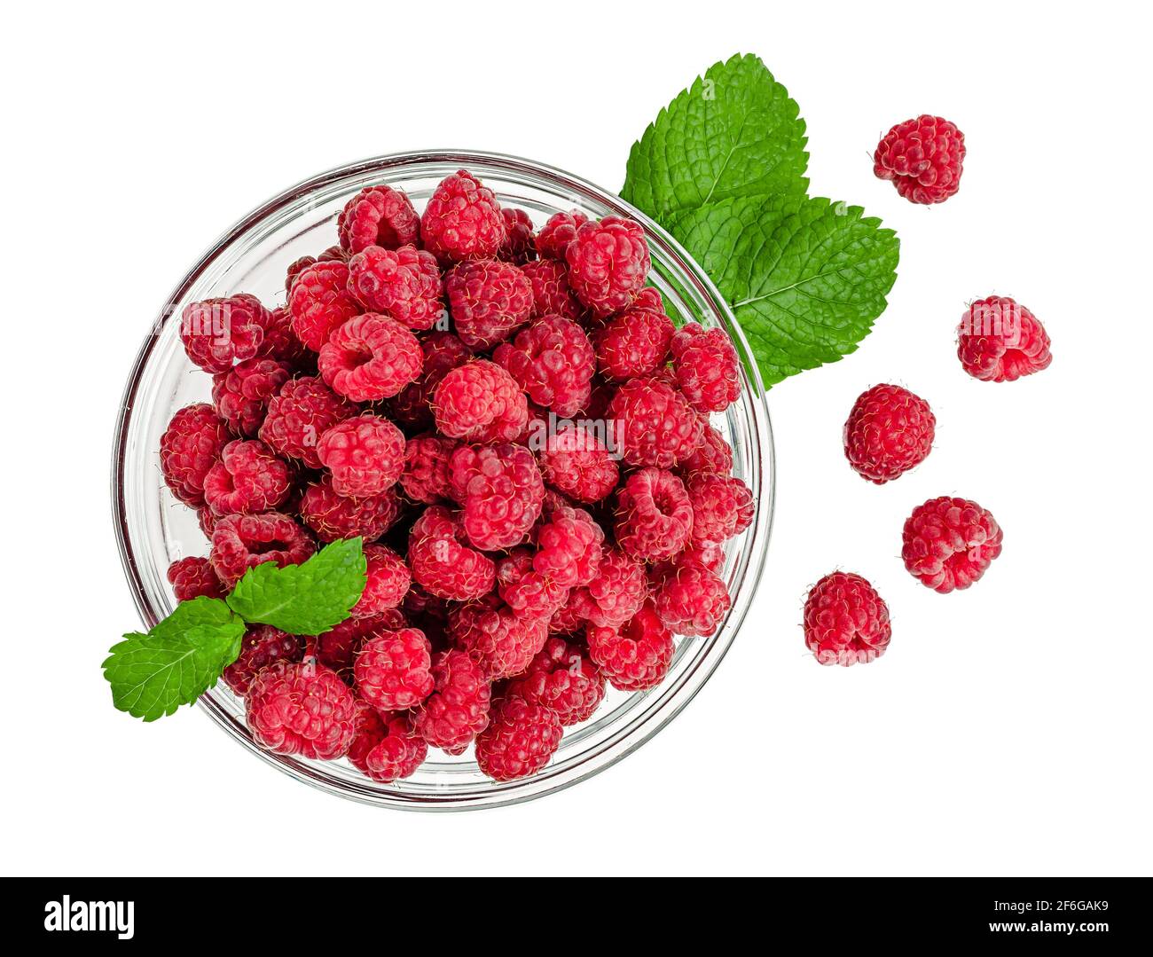 Red raspberries in a bowl isolated with clipping path. Top view Stock ...