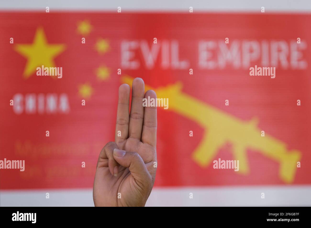 Los Angeles, California, USA. 31st Mar, 2021. A demonstrator shows a ...
