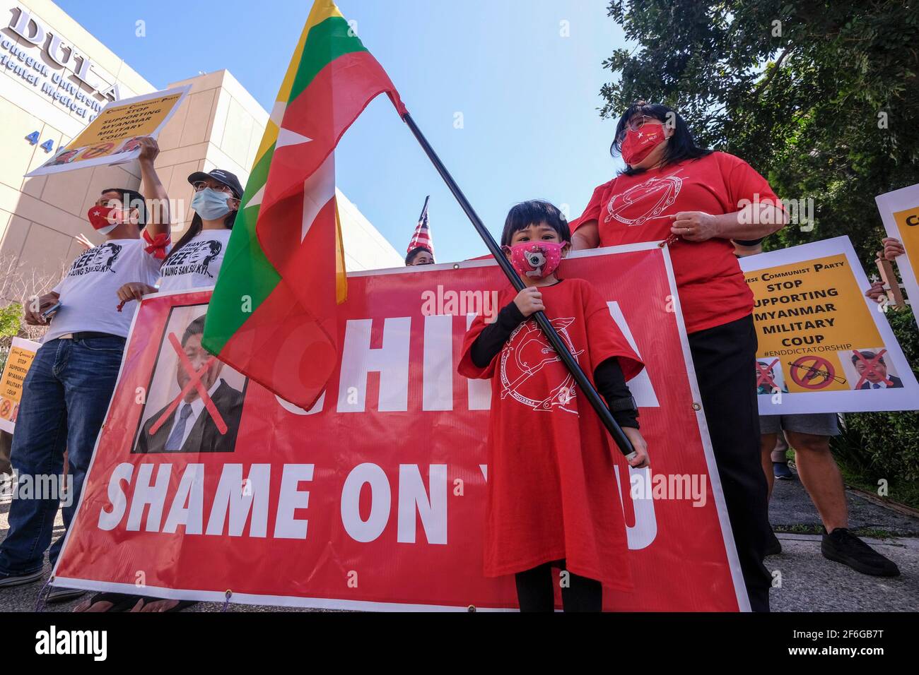 Los Angeles, California, USA. 31st Mar, 2021. A girl holding a Myanmar ...