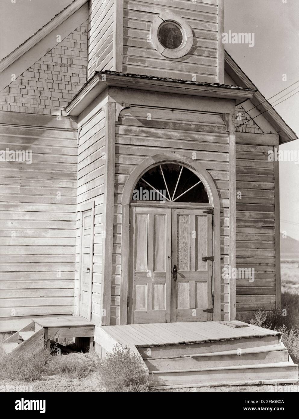 Old Catholic church on edge of potato town. "The Oakies and Arkies ...