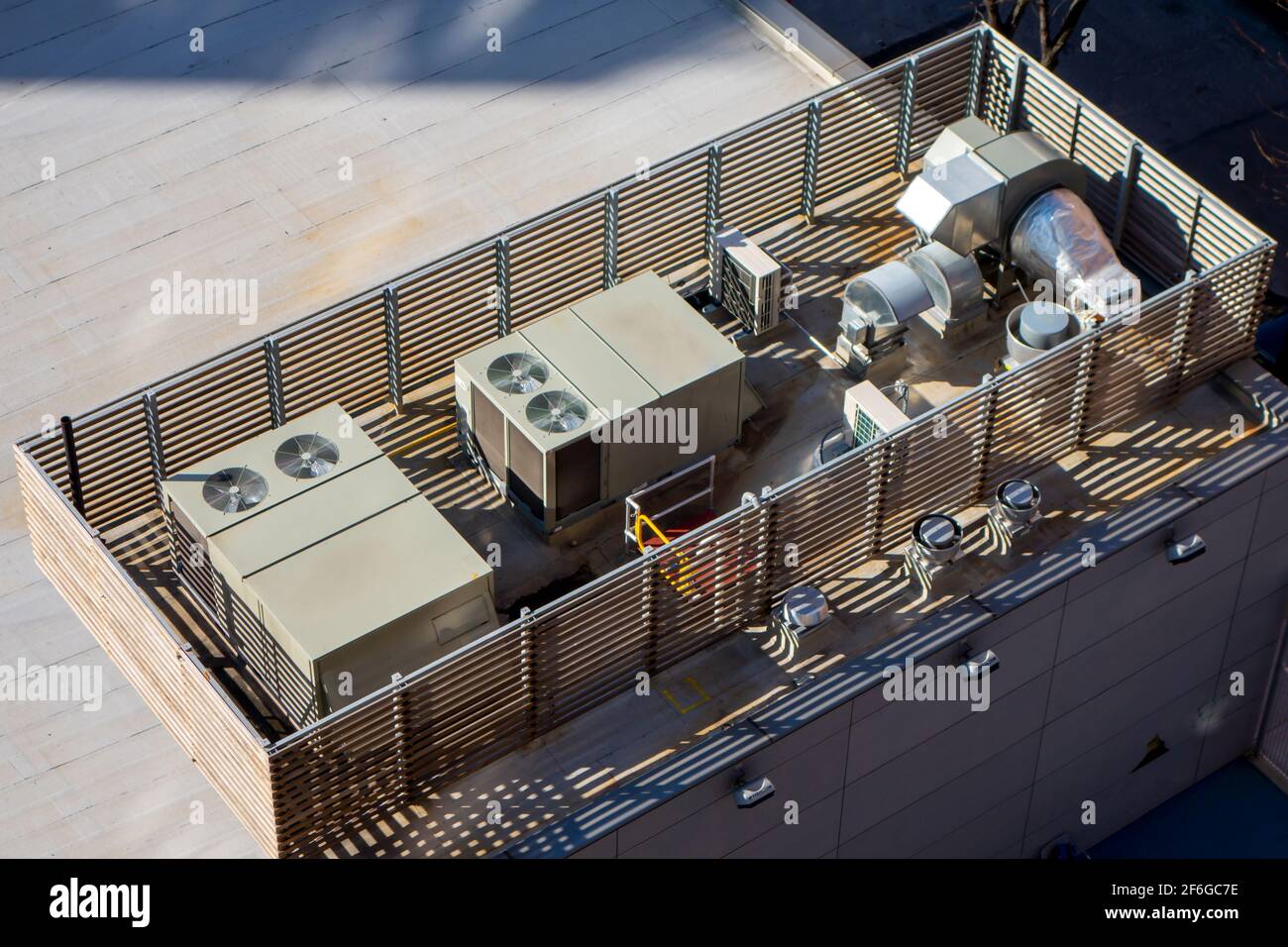 Rooftop city ac air unites and vents boxed in Stock Photo - Alamy
