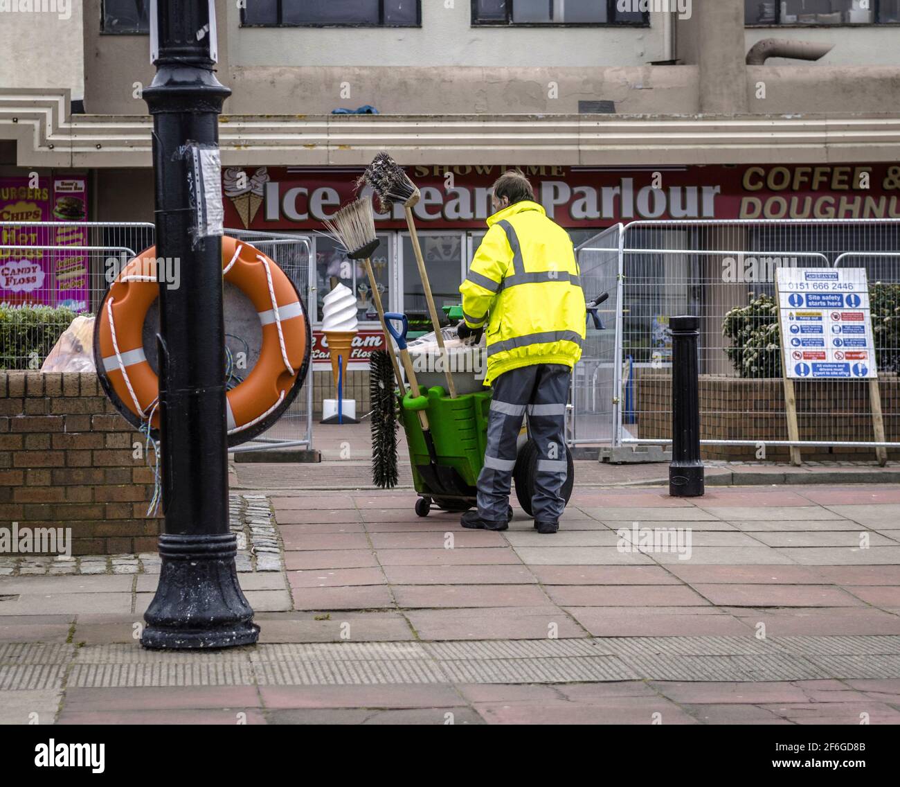 Man cleaning street high hi-res stock photography and images - Alamy