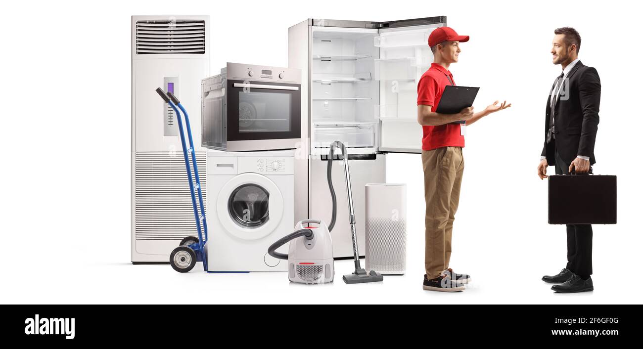 Full length shot of a shop assistant selling home electrical appliances ...