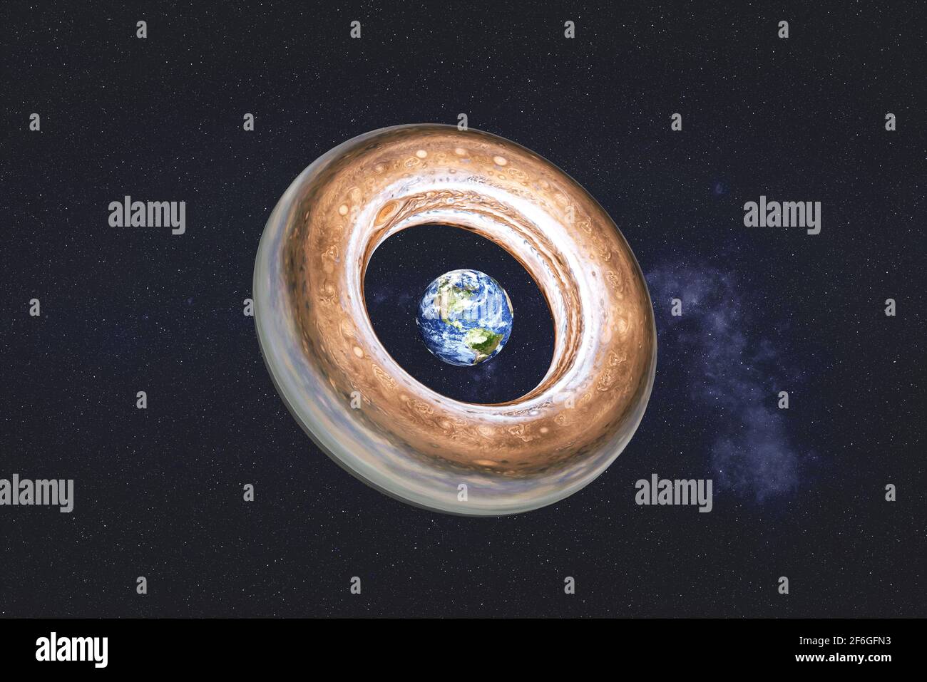 Fantastic torus Jupiter Planet with Earth planet in center. 3D rendered ...