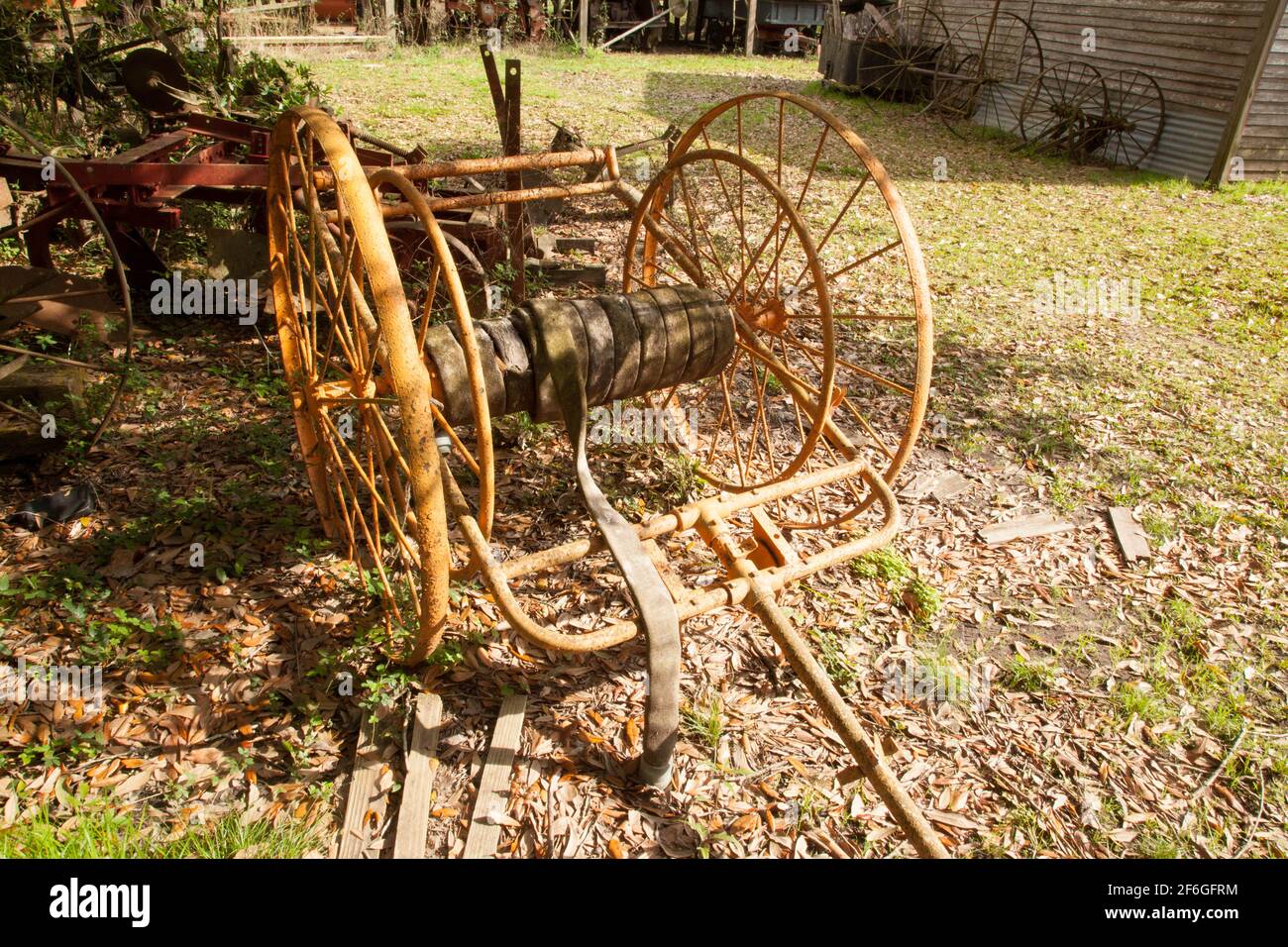 Old rusty farming equipment Stock Photo - Alamy