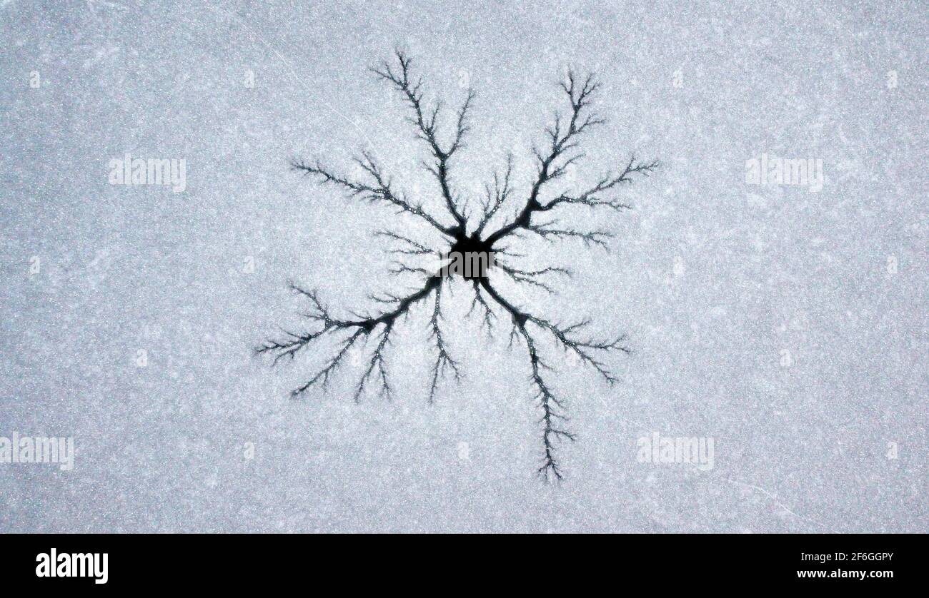 Aerial View of Hole In Ice On Frozen Lake Stock Photo - Alamy