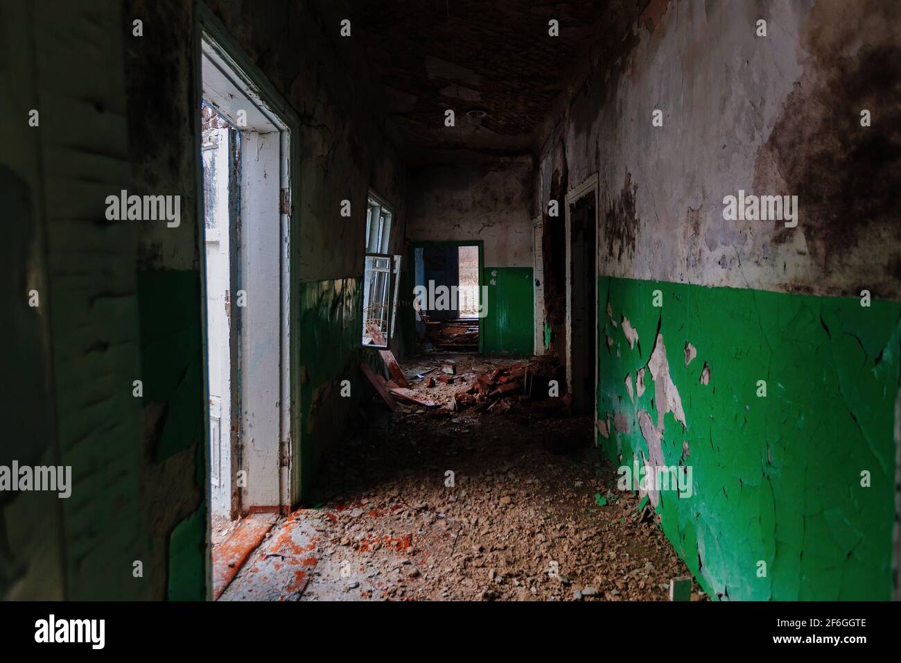Dark dirty corridor of old abandoned building Stock Photo - Alamy