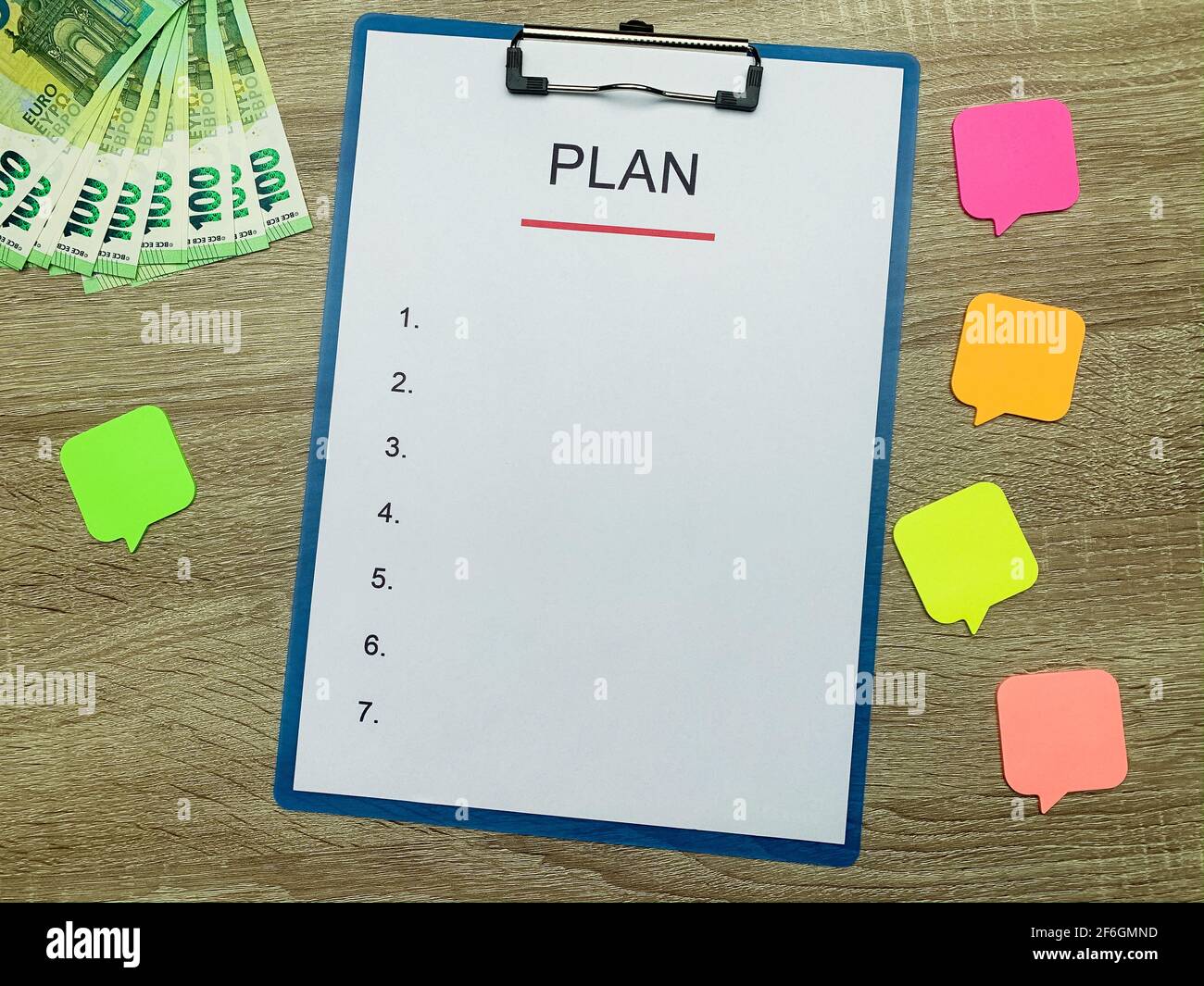 Clipboard with text plan on wood desk Stock Photo - Alamy