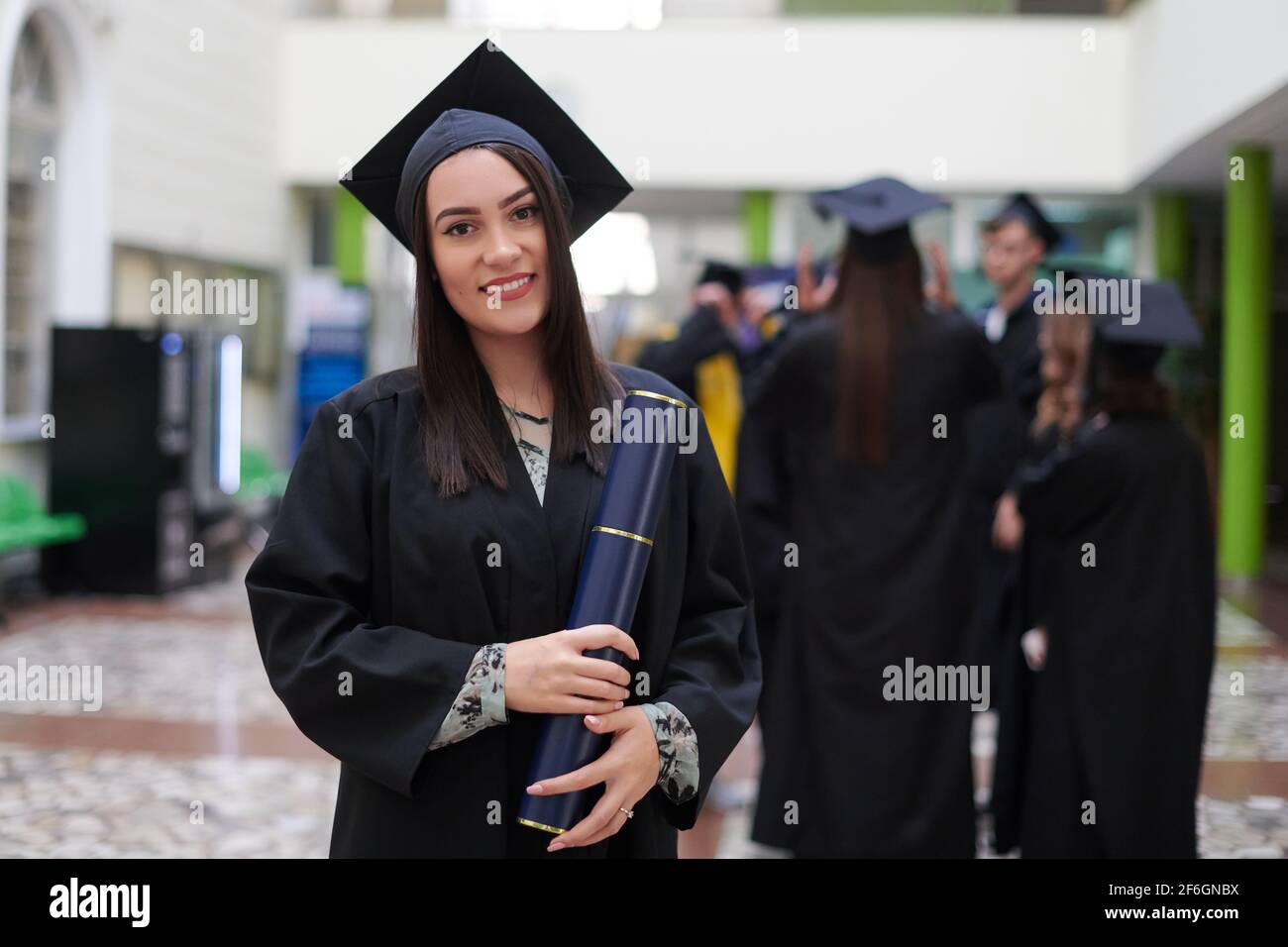 Happy woman portrait on her graduation day University. Education and ...