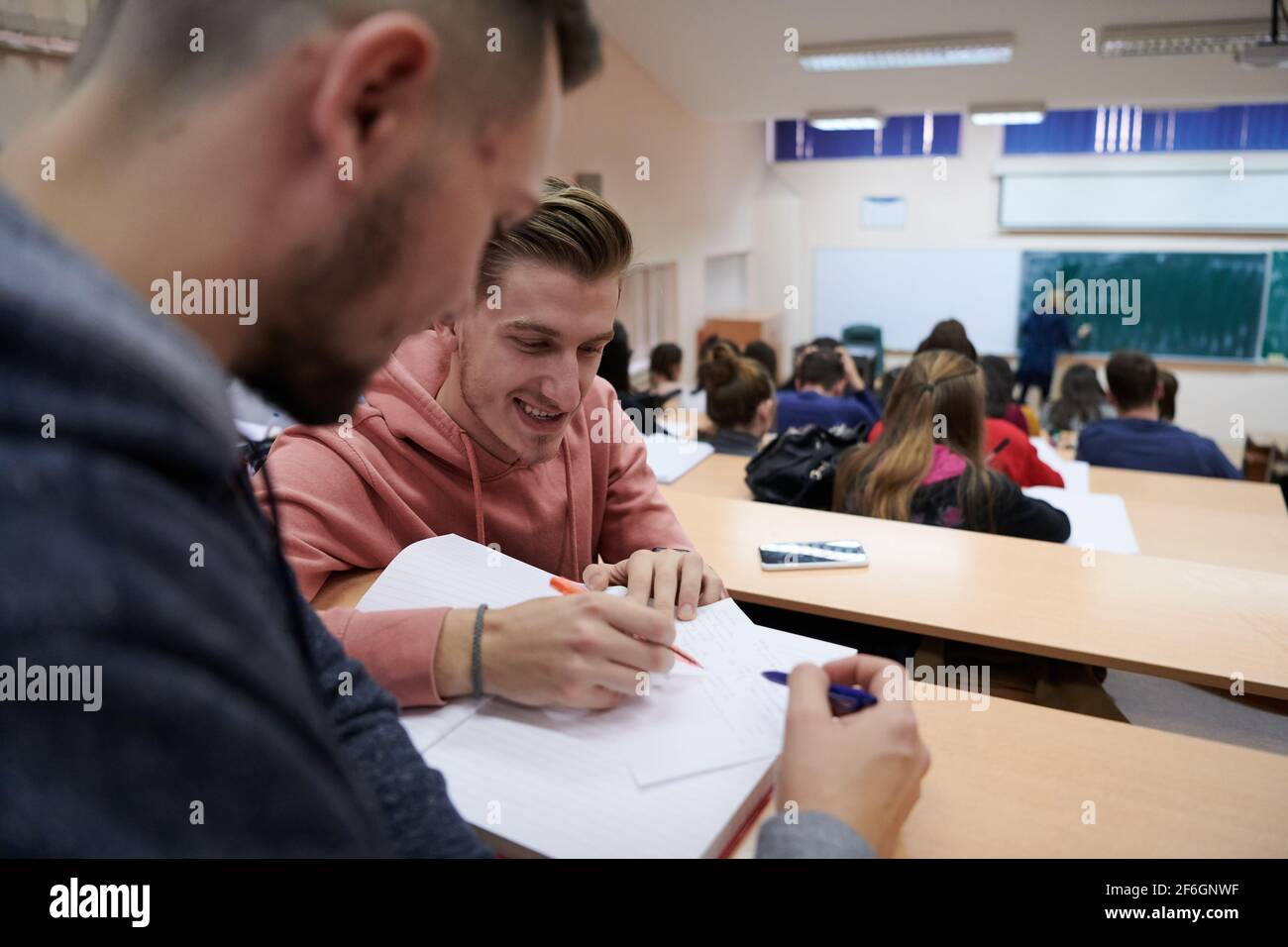 Female professor books discussion hi-res stock photography and images ...
