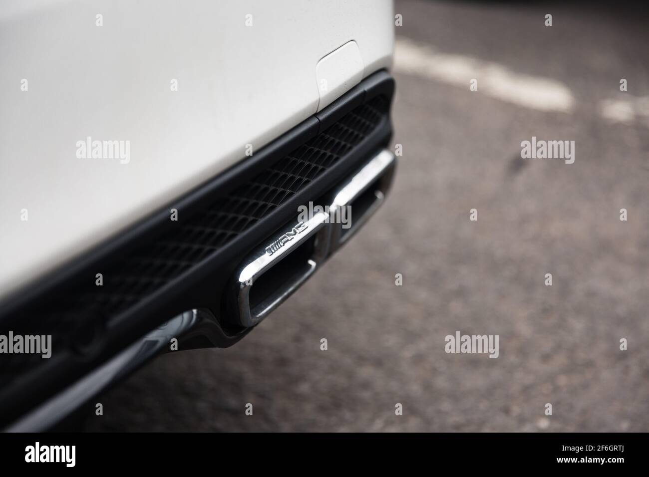 The Chrome Exhaust Tips On A 2017 Mercedes Benz C63 AMG W205 Saloon In ...
