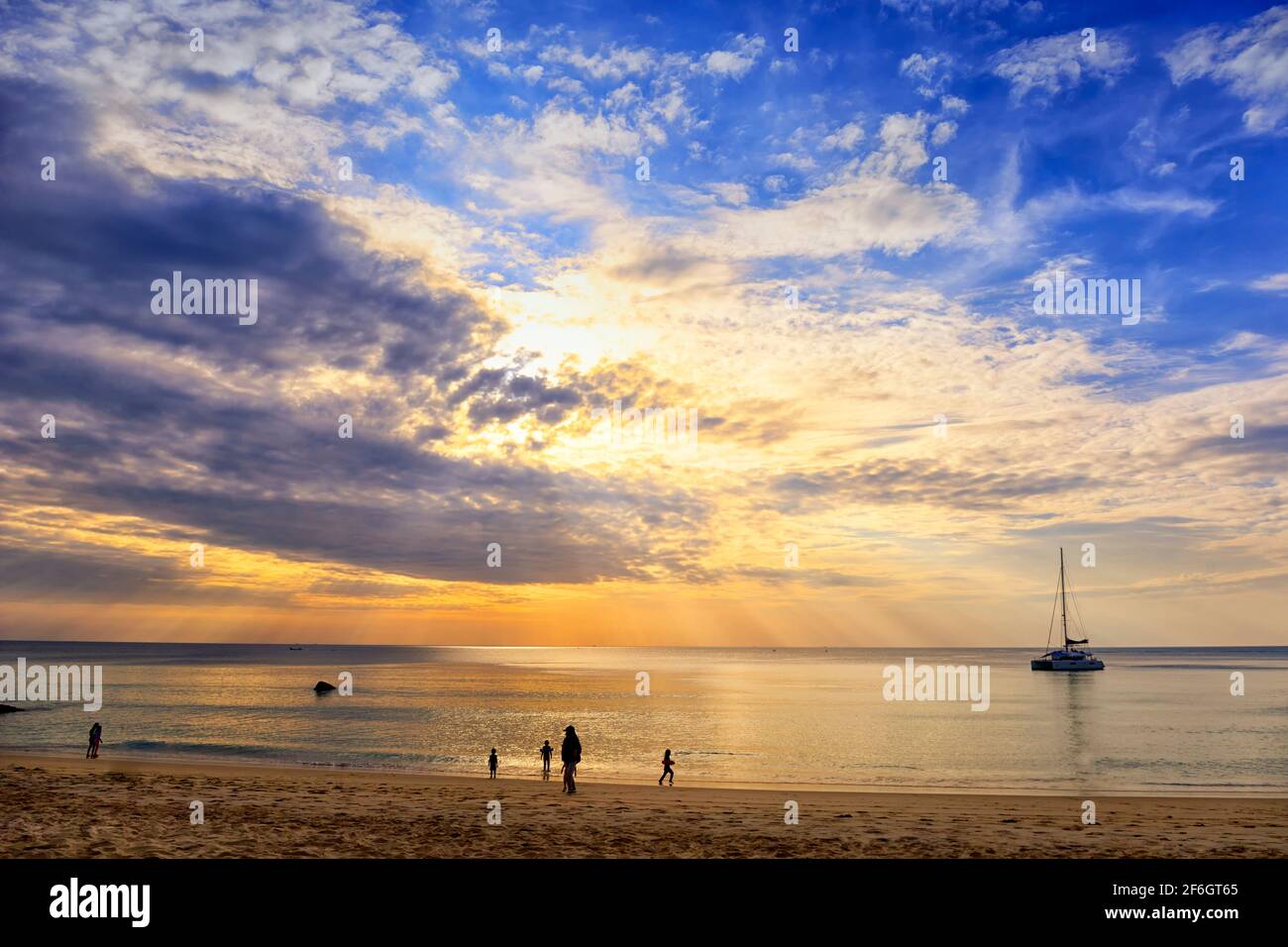 Beautiful sunset over the clam sea with cloud and sky background ...