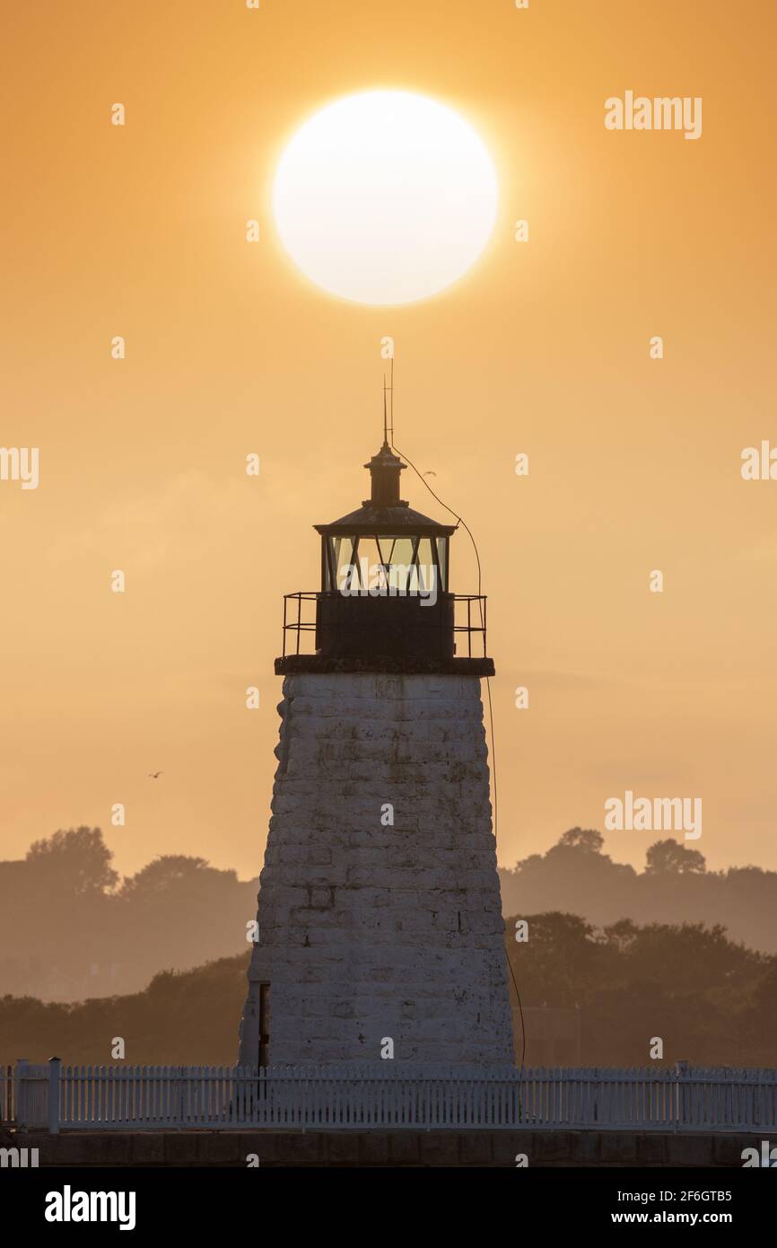 Goat Island Lighthouse at sunset, aka Newport Harbor Lighthouse ...