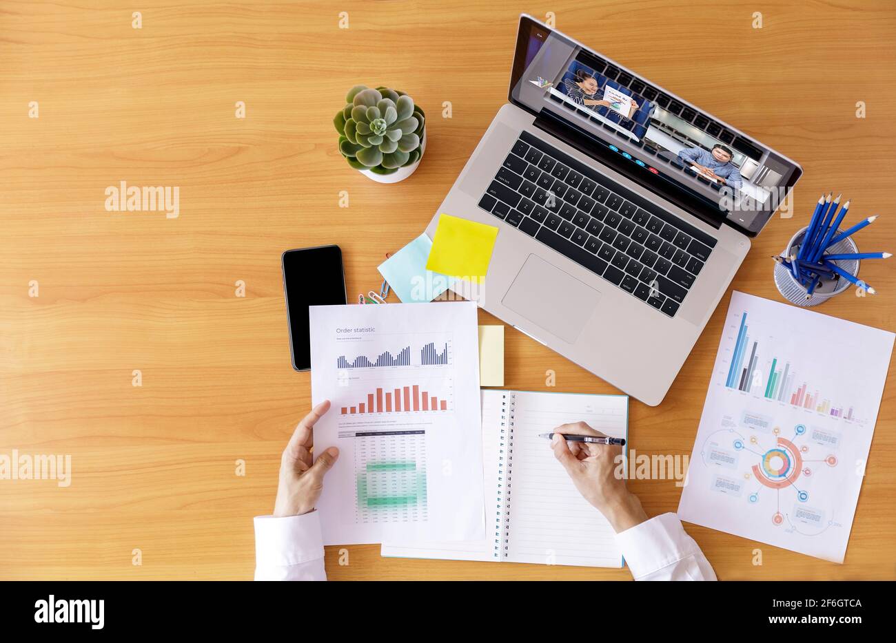 Top view Businessman and businesswoman analysis financial chart with ...