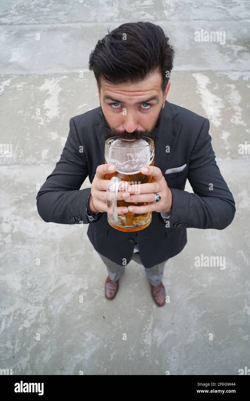 Craft beer. Funny man with glass of beer. Degustation and tasting. Full ...