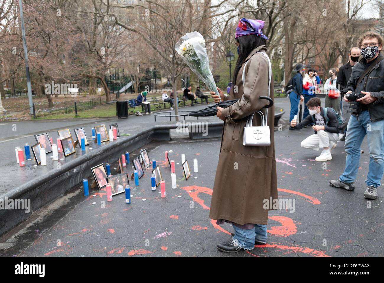 New York, New York, USA. 31st Mar, 2021. Mourners pay tribute to a pop ...