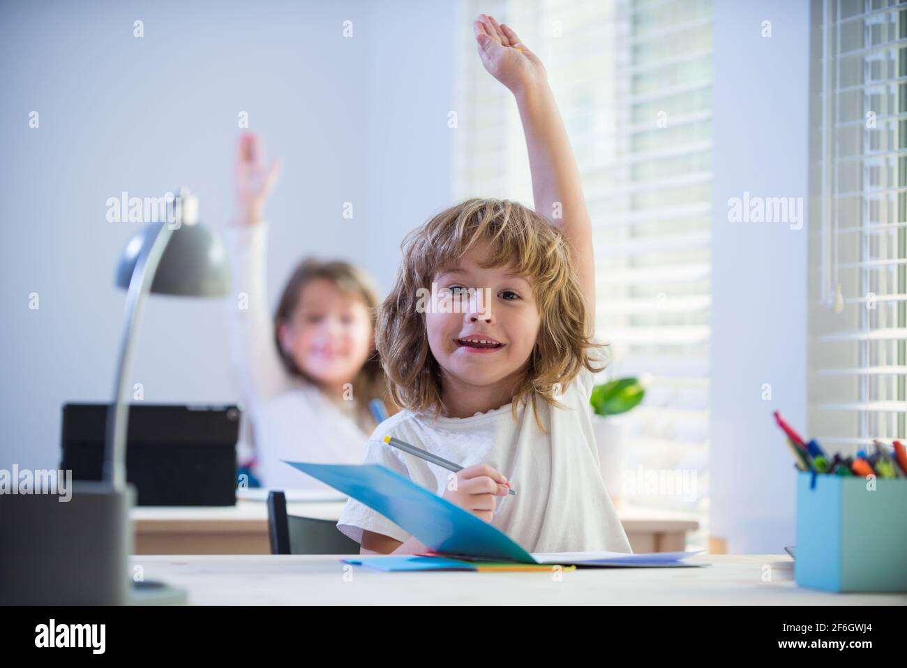 Schoolboy answering. Lesson in classroom. Education and learning ...