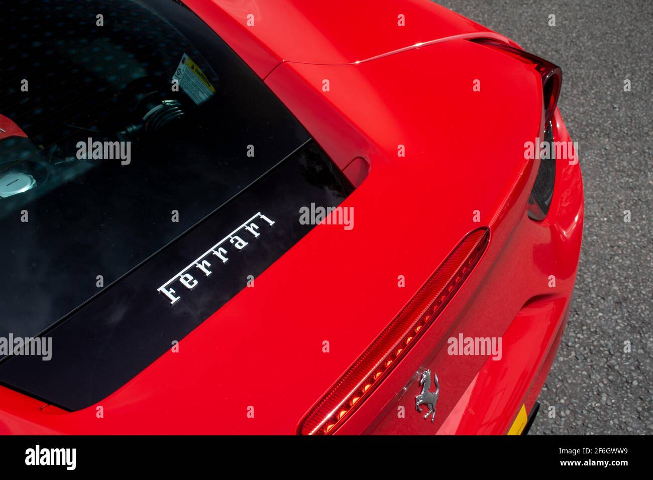 The Ferrari Logo On The Engine Cover On The Rear Of A Red 2017 Ferrari ...