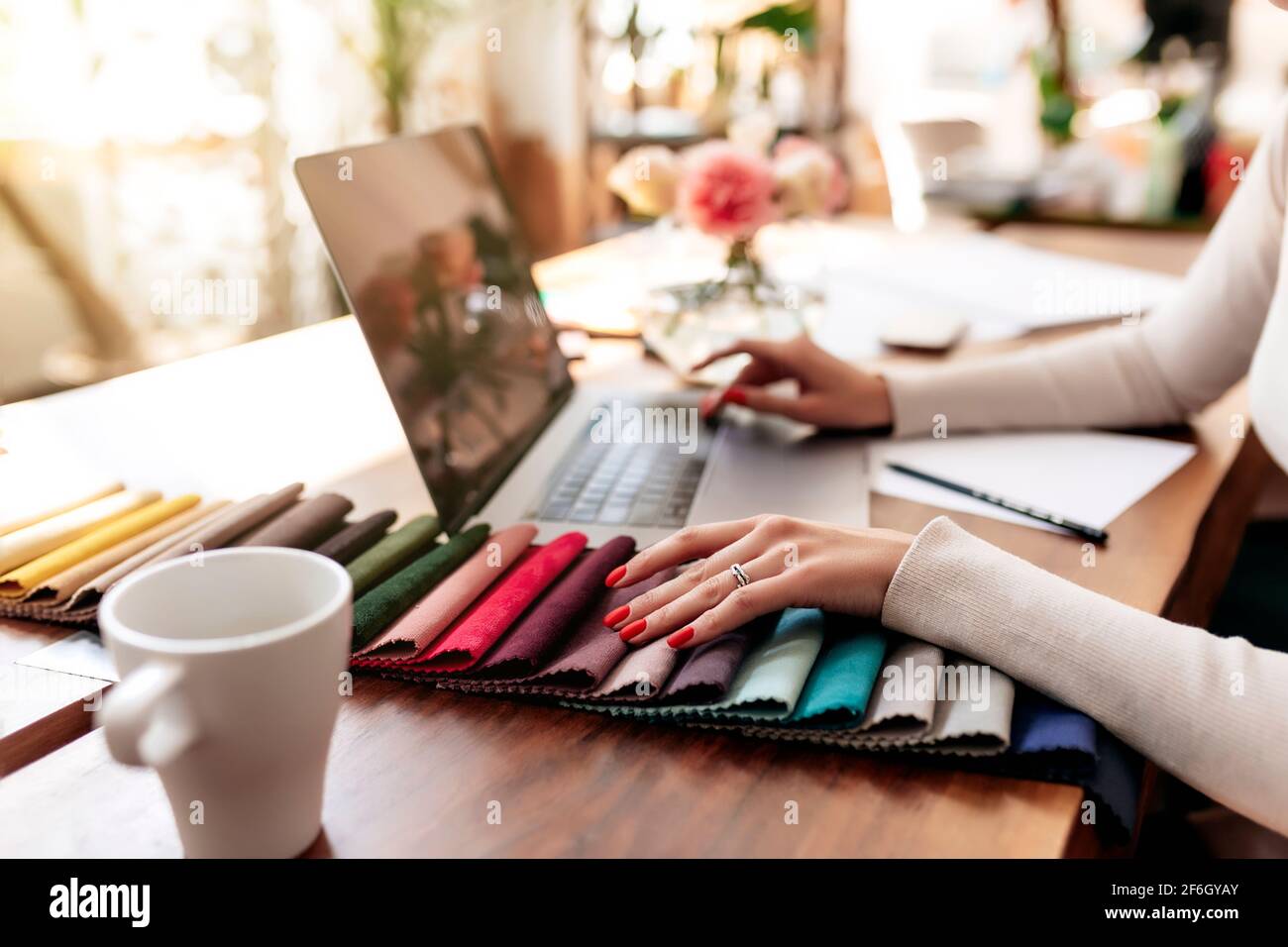 An interior designer is working on a new project Stock Photo - Alamy