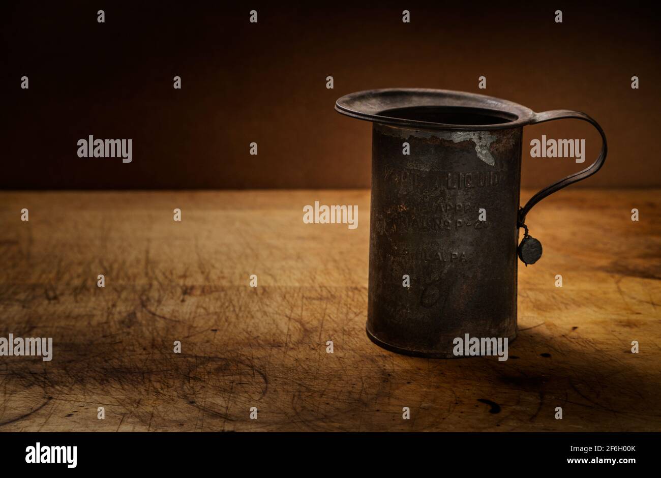Old metal cup Stock Photo - Alamy