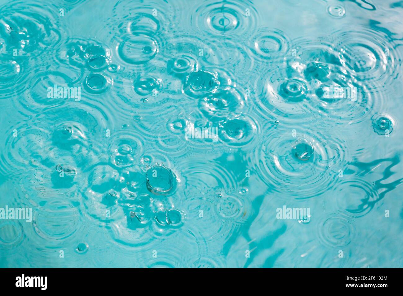 Concentric ripples on water surface Stock Photo - Alamy