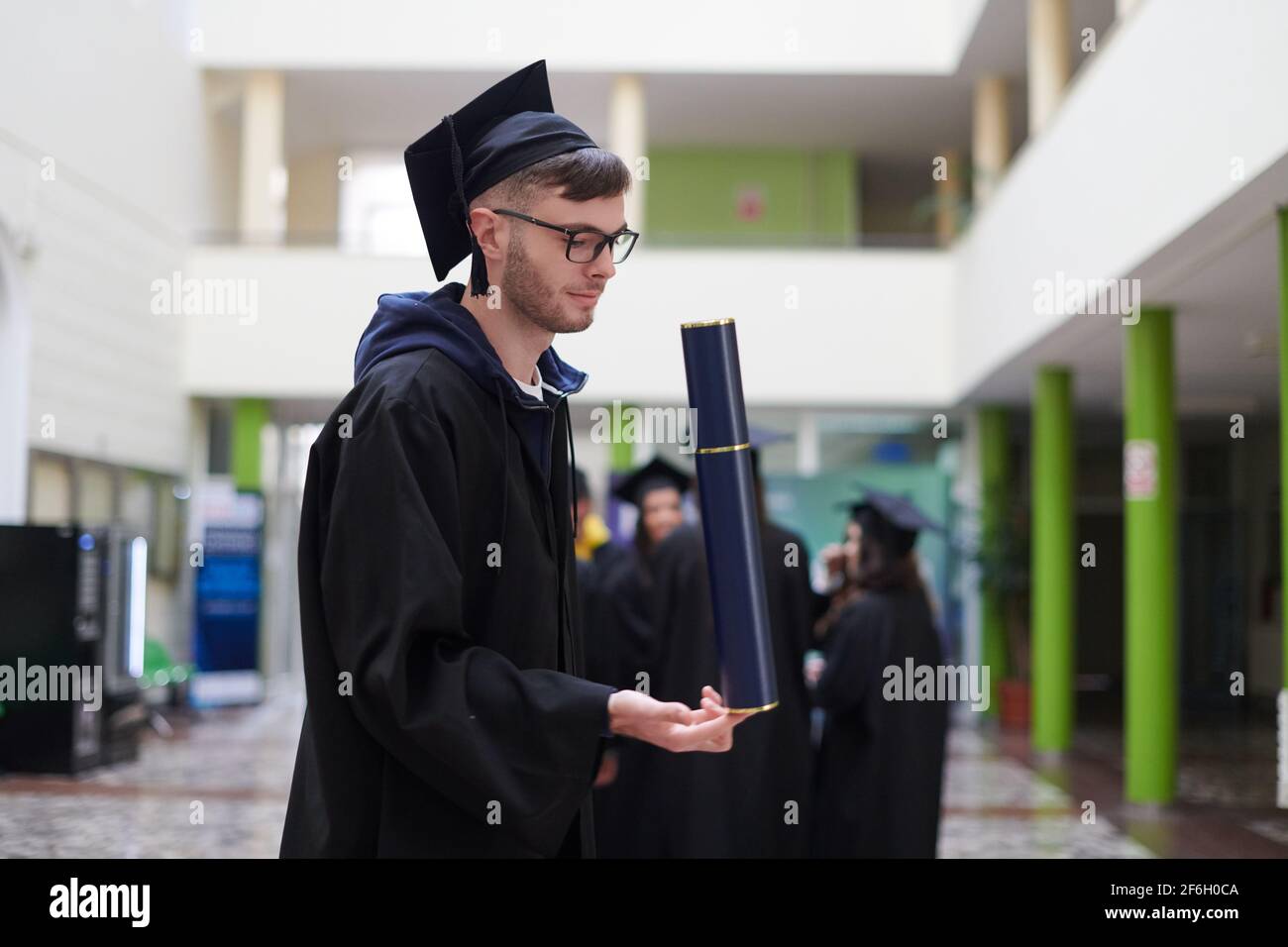 Happy man portrait on her graduation day University. Education and ...