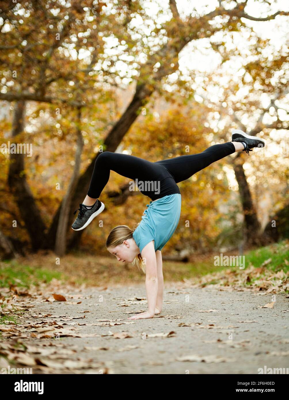 Girl doing handstand hi-res stock photography and images - Alamy