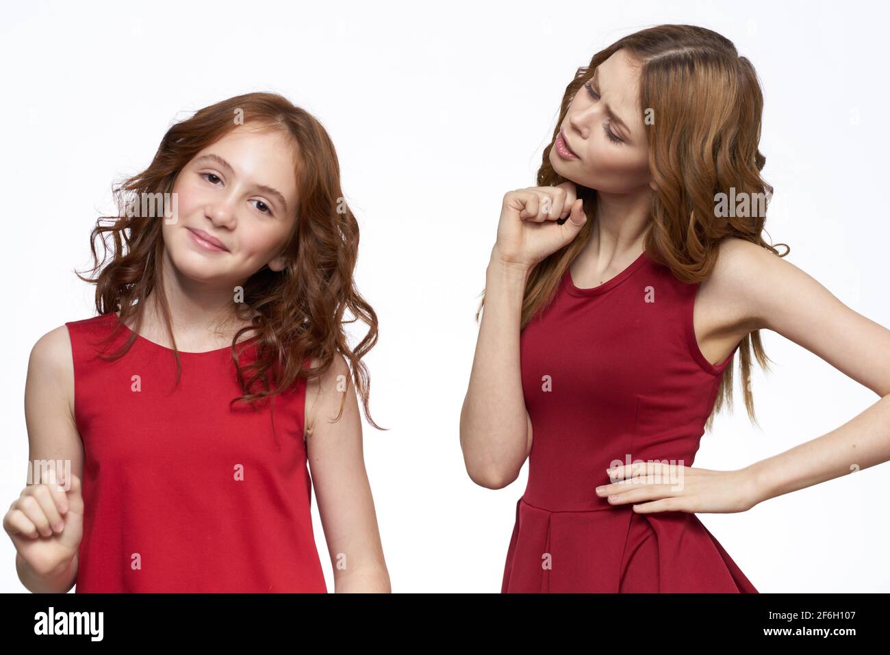 Joyful family fun mom daughter emotions light background Stock Photo ...