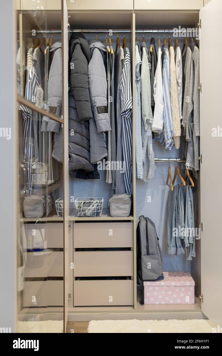 Wardrobe with perfect order clothes shades Stock Photo - Alamy