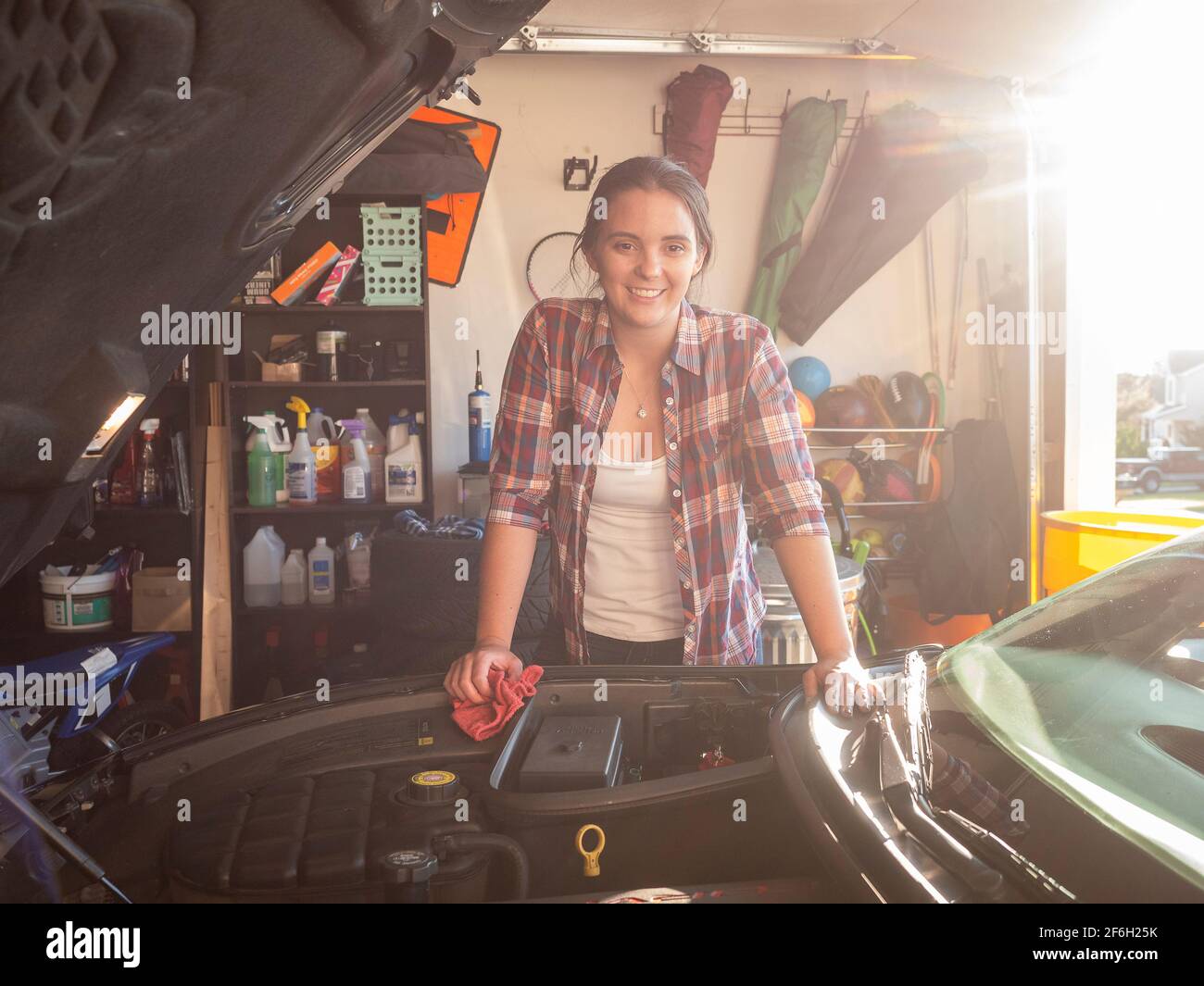 Woman fixing car hi-res stock photography and images - Alamy