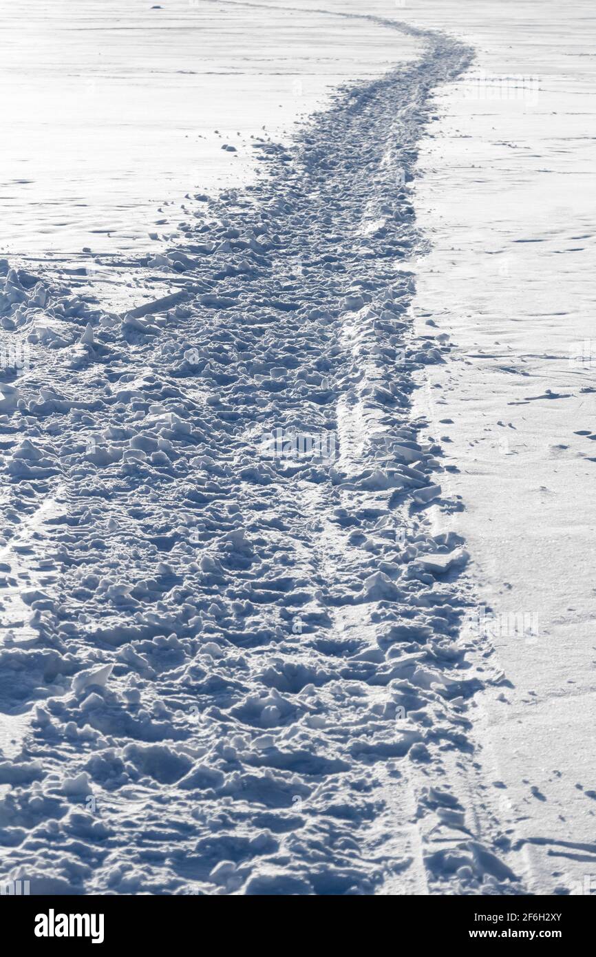 A trodden path along the surface of a frozen river Stock Photo - Alamy