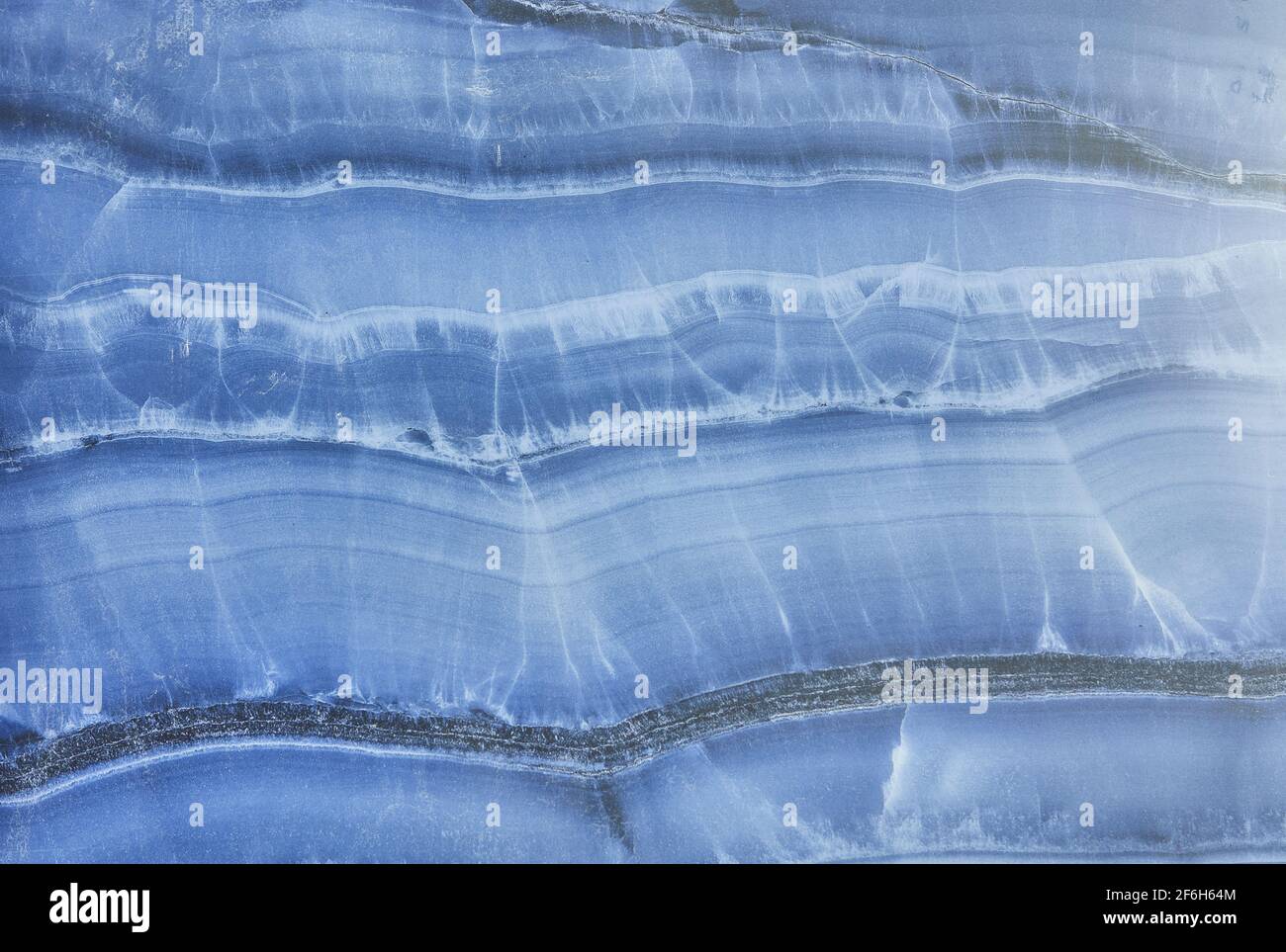 Stone texture in blue with white streaks in the form of the seabed ...