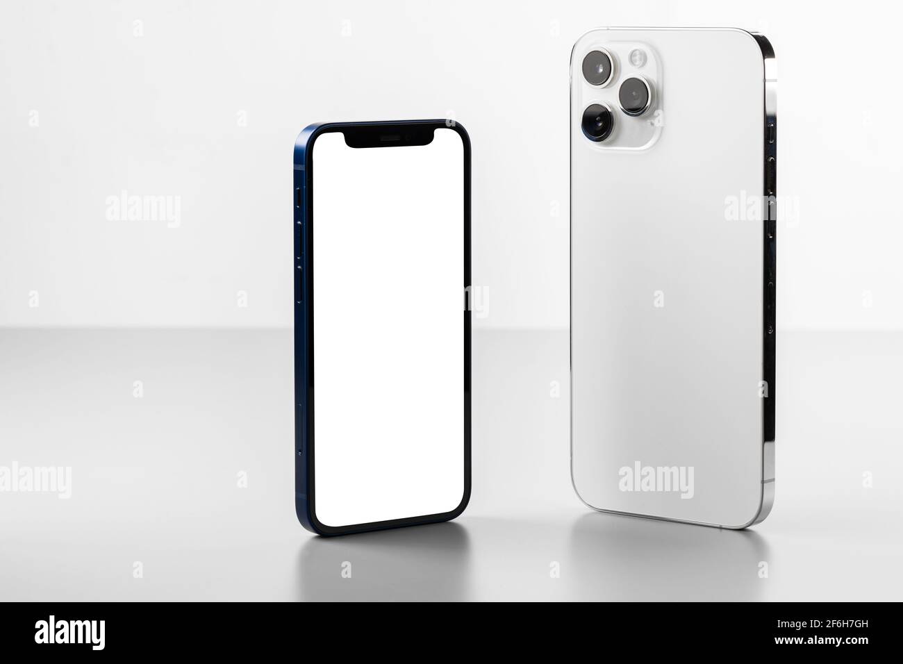 Two modern mobile phone mockup, front and back sides, gray background ...