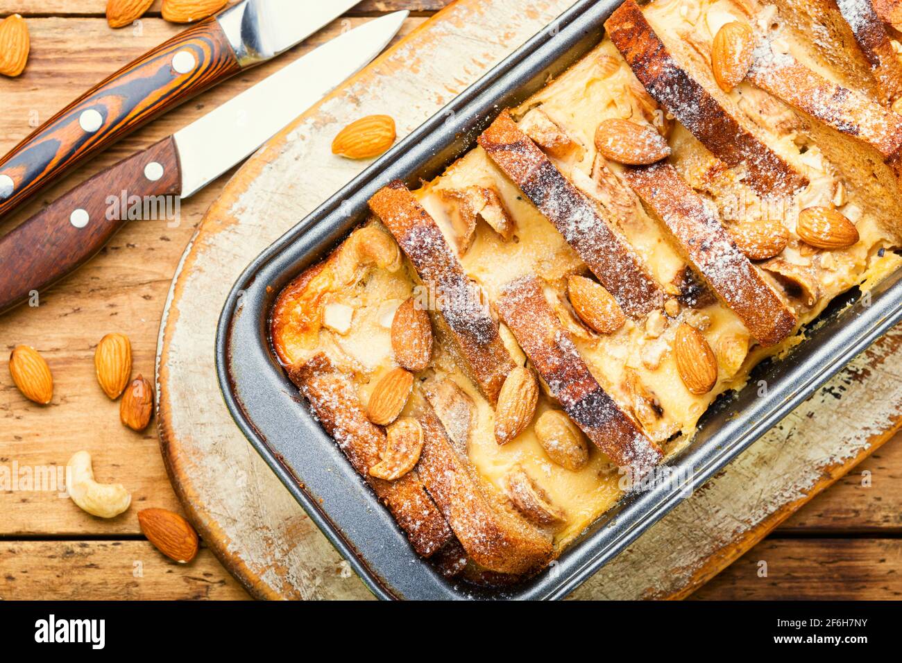 Dessert of toast bread,cottage cheese,banana and nuts.French breakfast ...