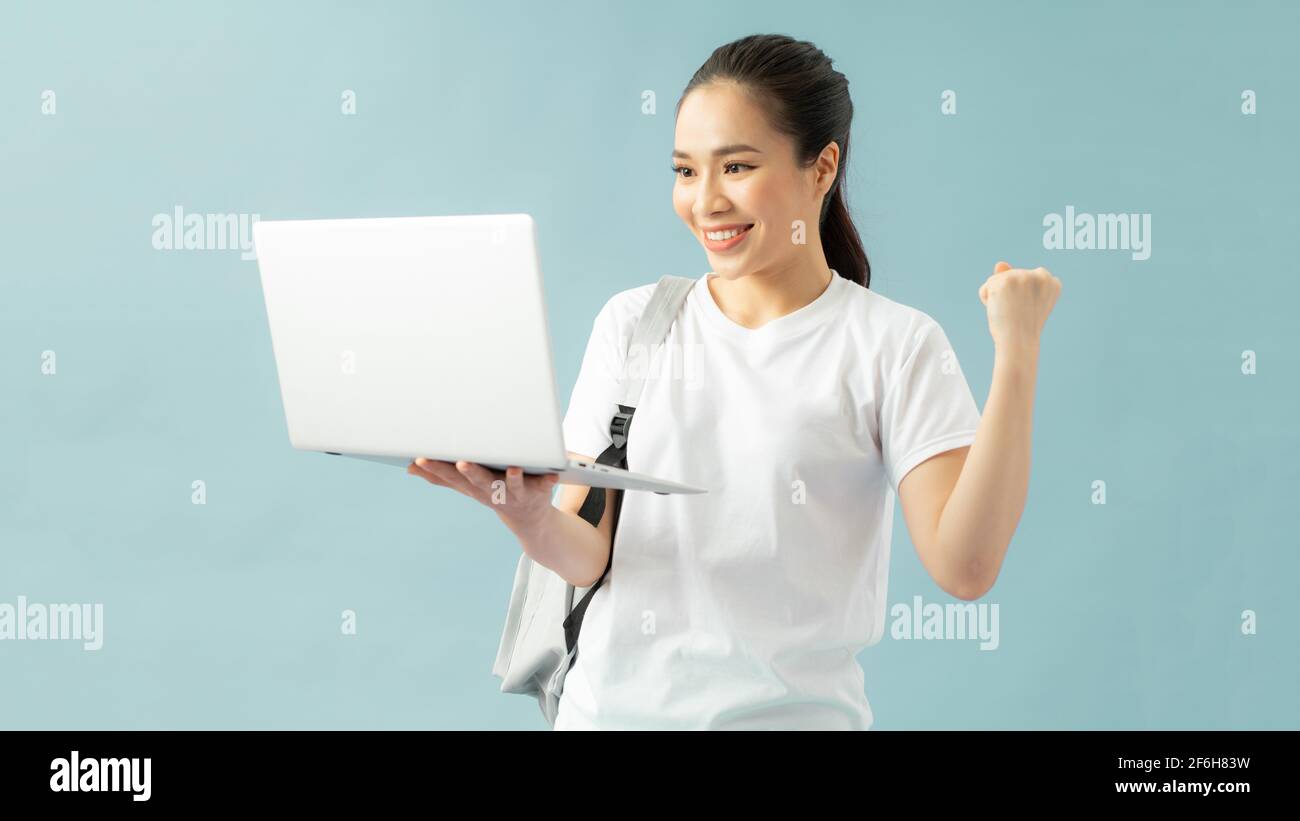 Excited student girl raised hi-res stock photography and images - Alamy