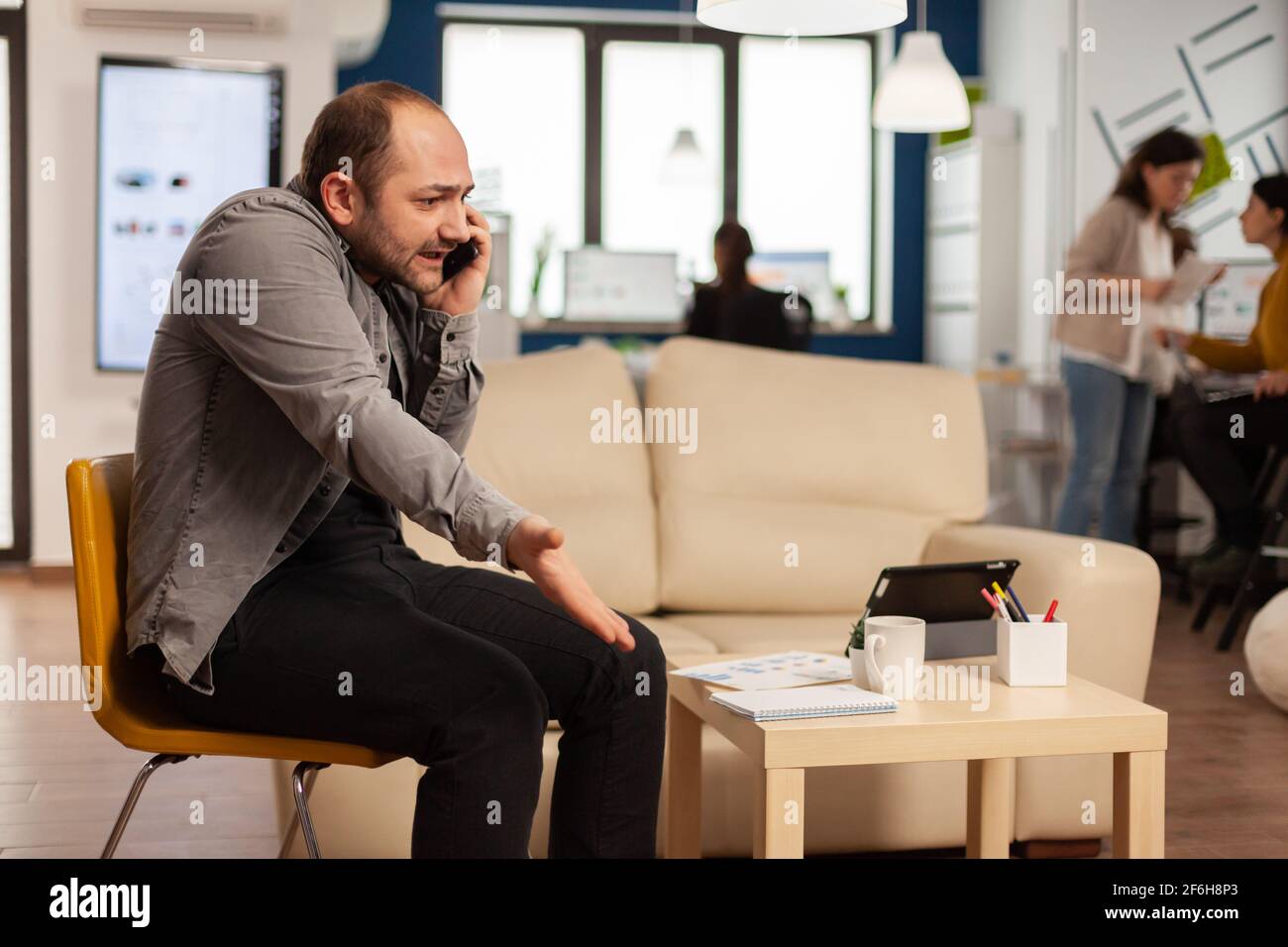 Angry furious businessman working on hi-res stock photography and ...