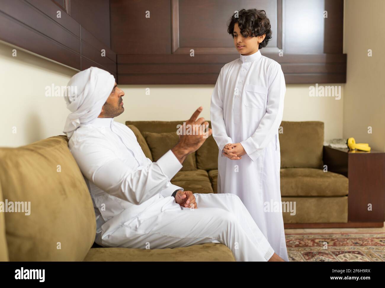 Arabian father and Son having a conversation Stock Photo - Alamy