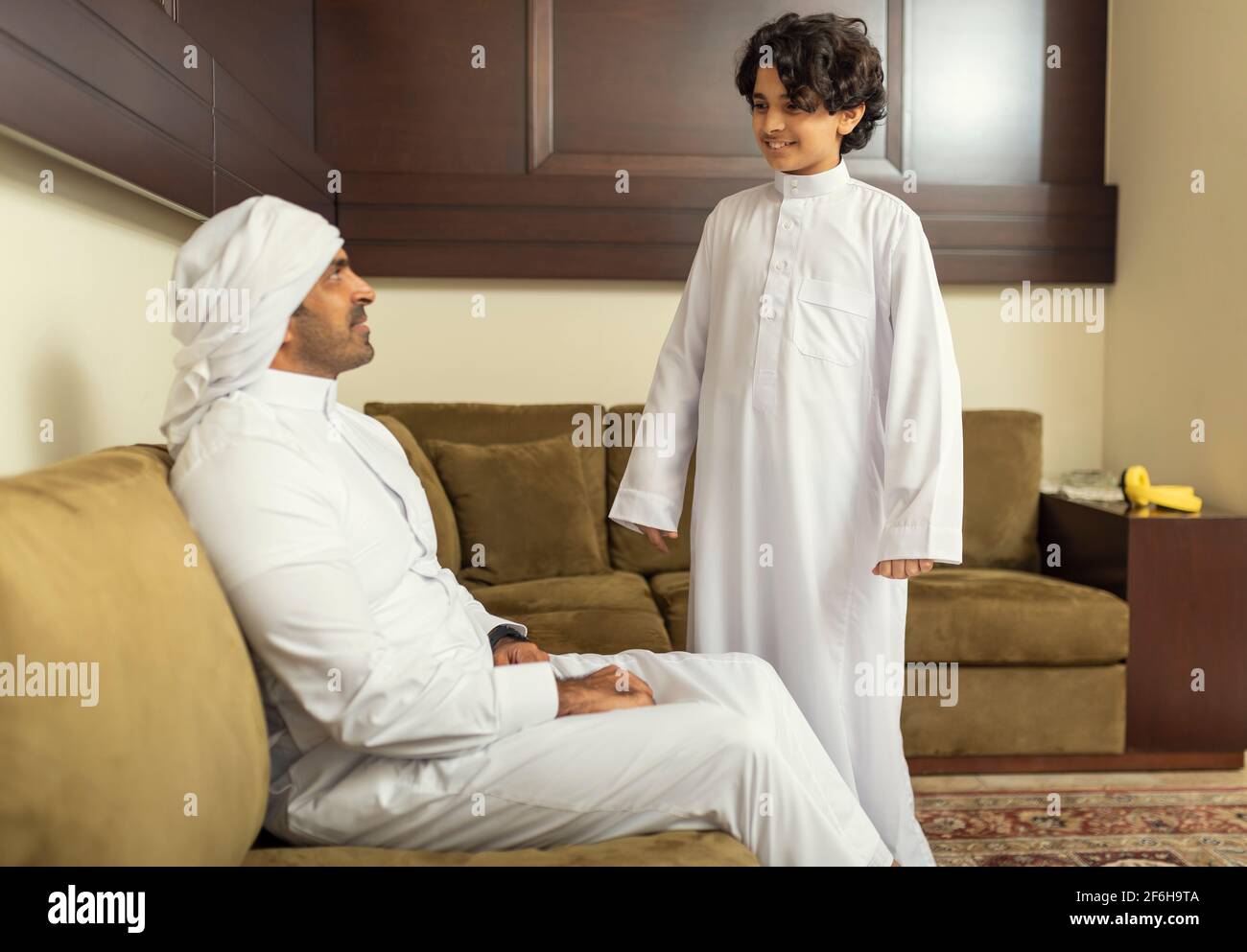 Arabian father and Son having a conversation Stock Photo - Alamy