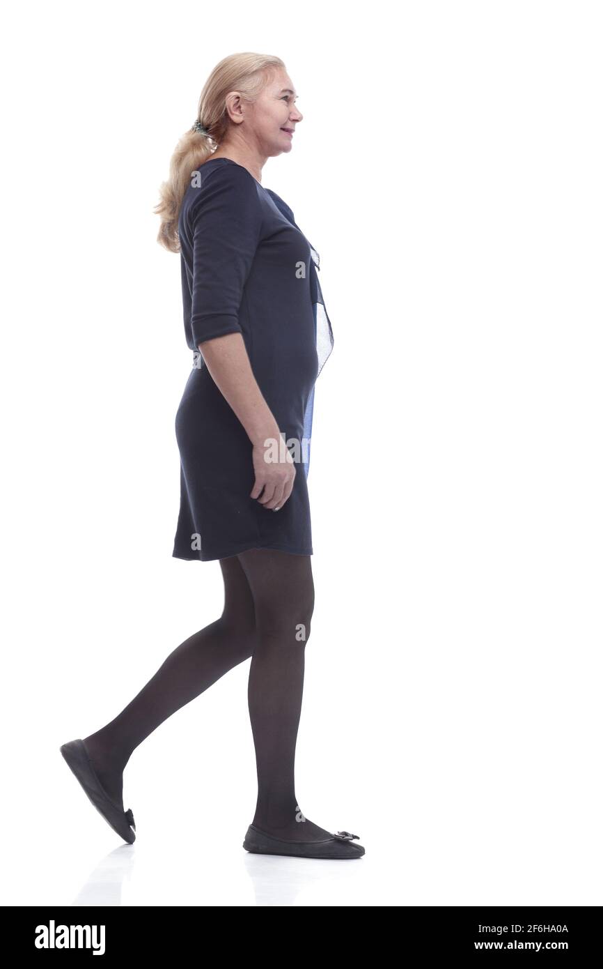 in full growth. happy mature woman stepping forward Stock Photo - Alamy