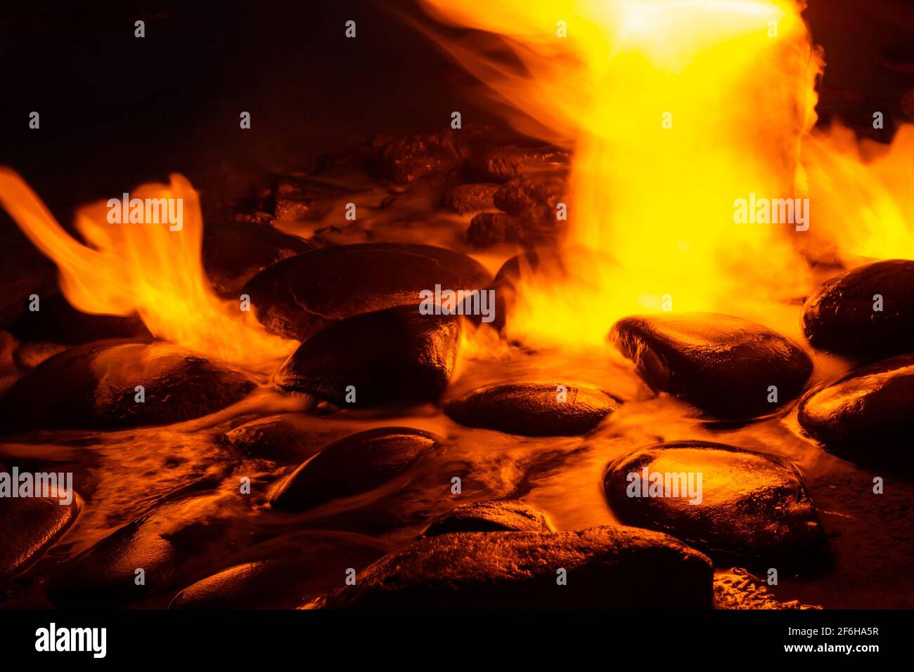 Spring of fire water. Burning methane in water. Cold fire Stock Photo ...