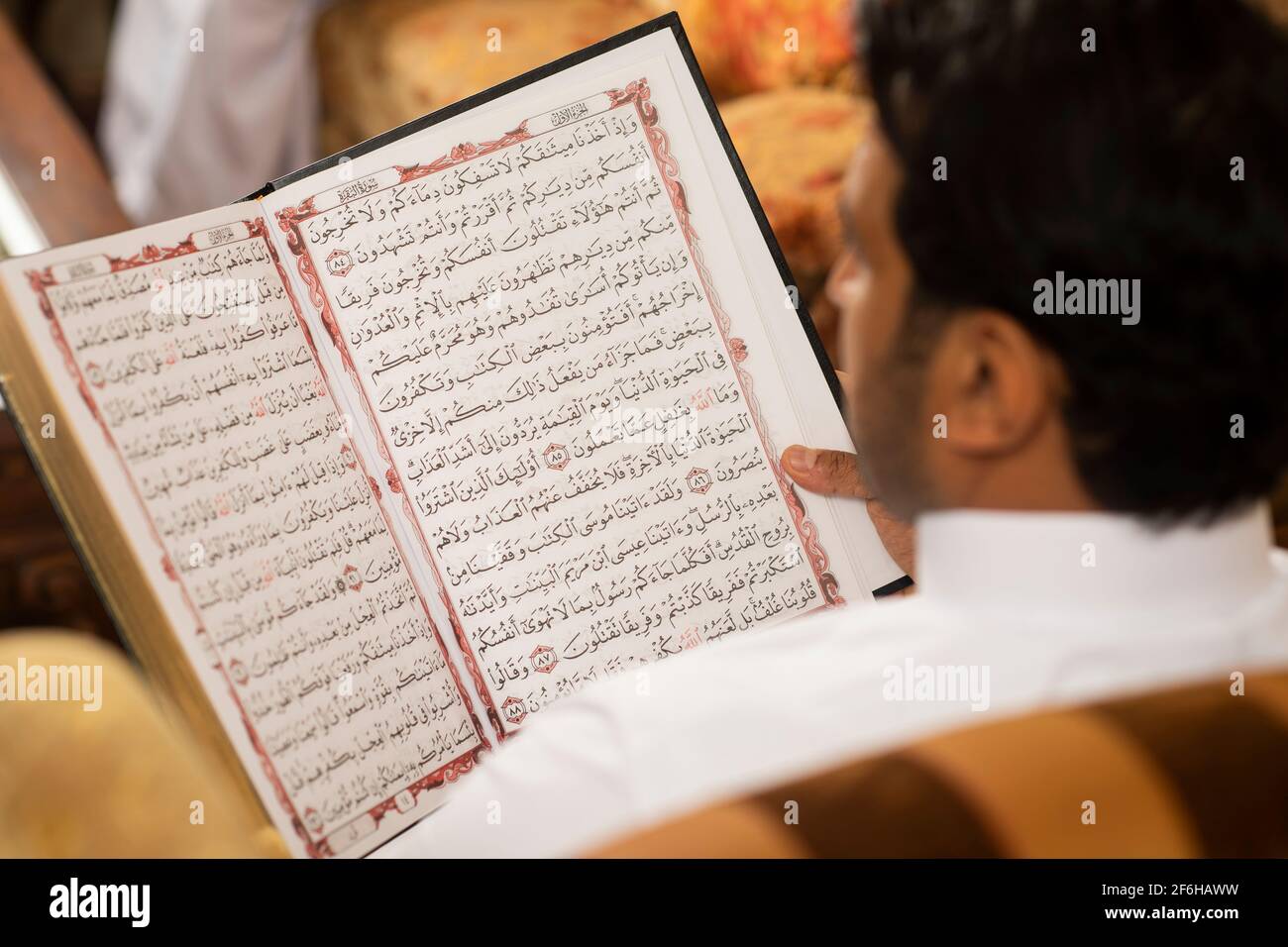 Reading quran oman hi-res stock photography and images - Alamy