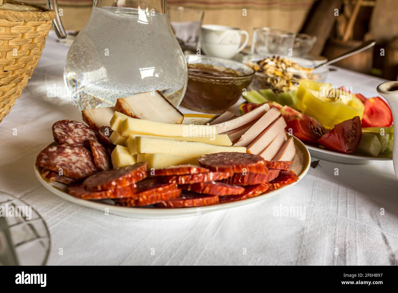 Traditional food for breakfast of meats, cheeses, and vegetables in ...