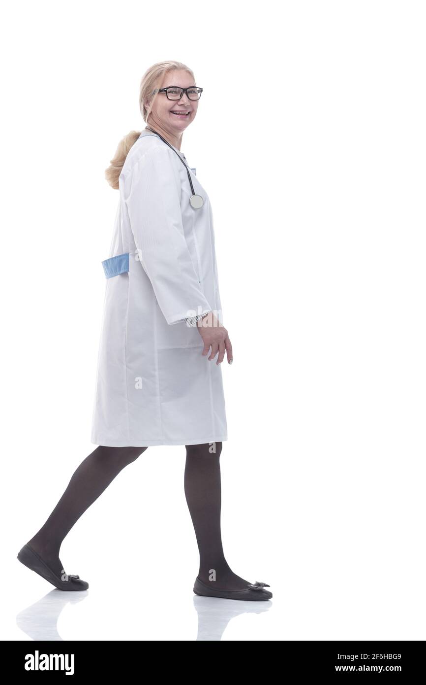 side view. experienced female doctor stepping forward Stock Photo - Alamy