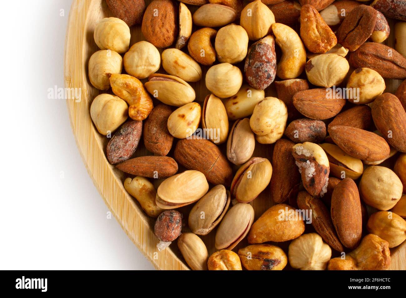 Freshly Roasted Mixed Nuts Plate Stock Photo - Alamy