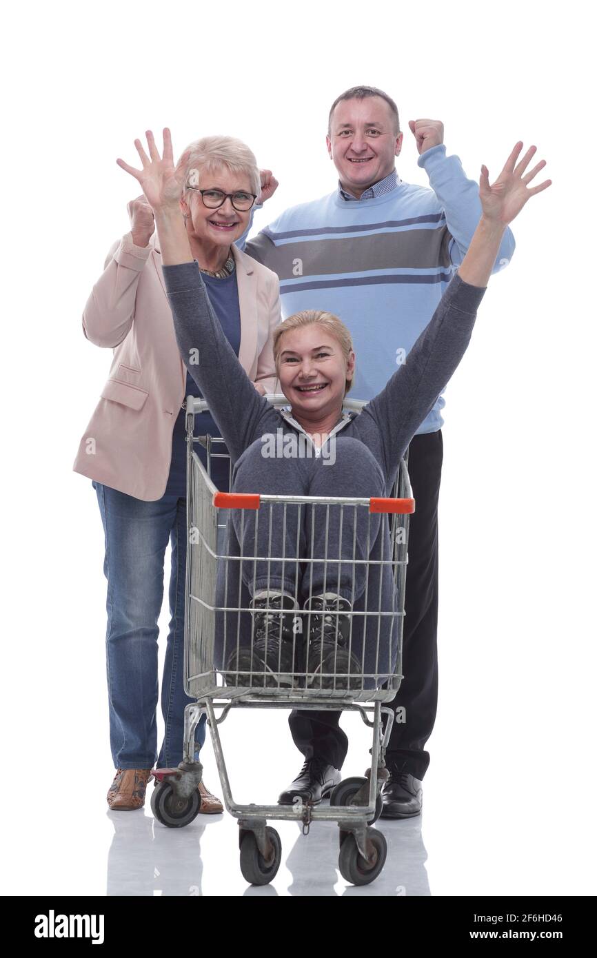 in full growth. a group of cheerful shoppers with a shopping cart Stock ...