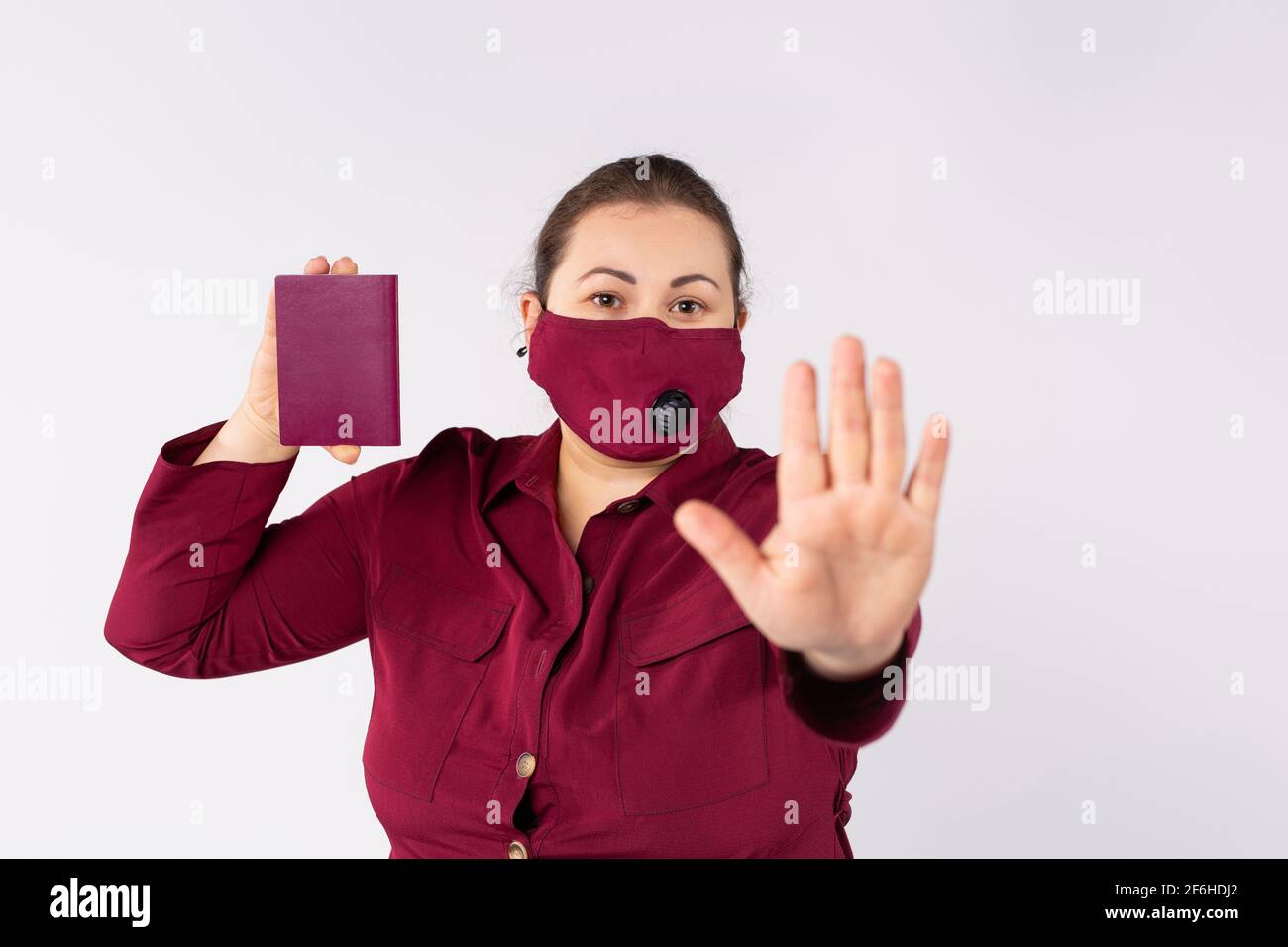 Woman holds hand palm forward hi-res stock photography and images - Alamy