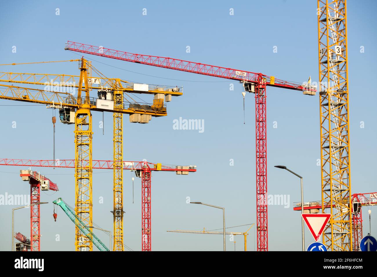 Cranes on the large construction site, a new district is being built ...