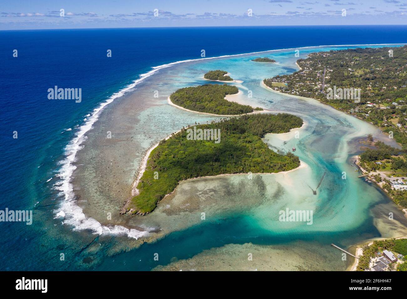 Stunning aerial view of the Muri beach and lagoon, in Rarotonga in the ...