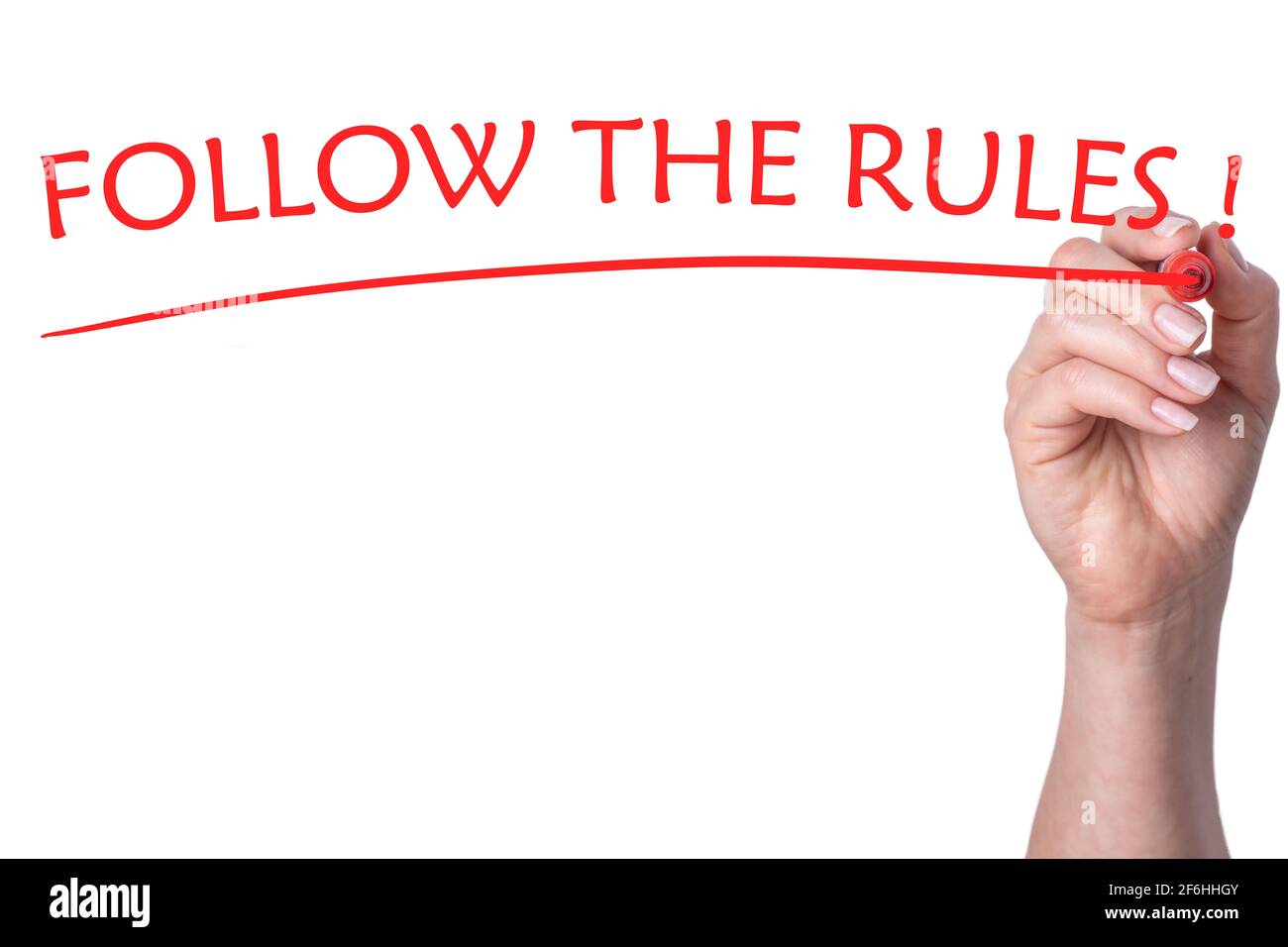 Hand writes words follow the rules with red marker on transparent white ...