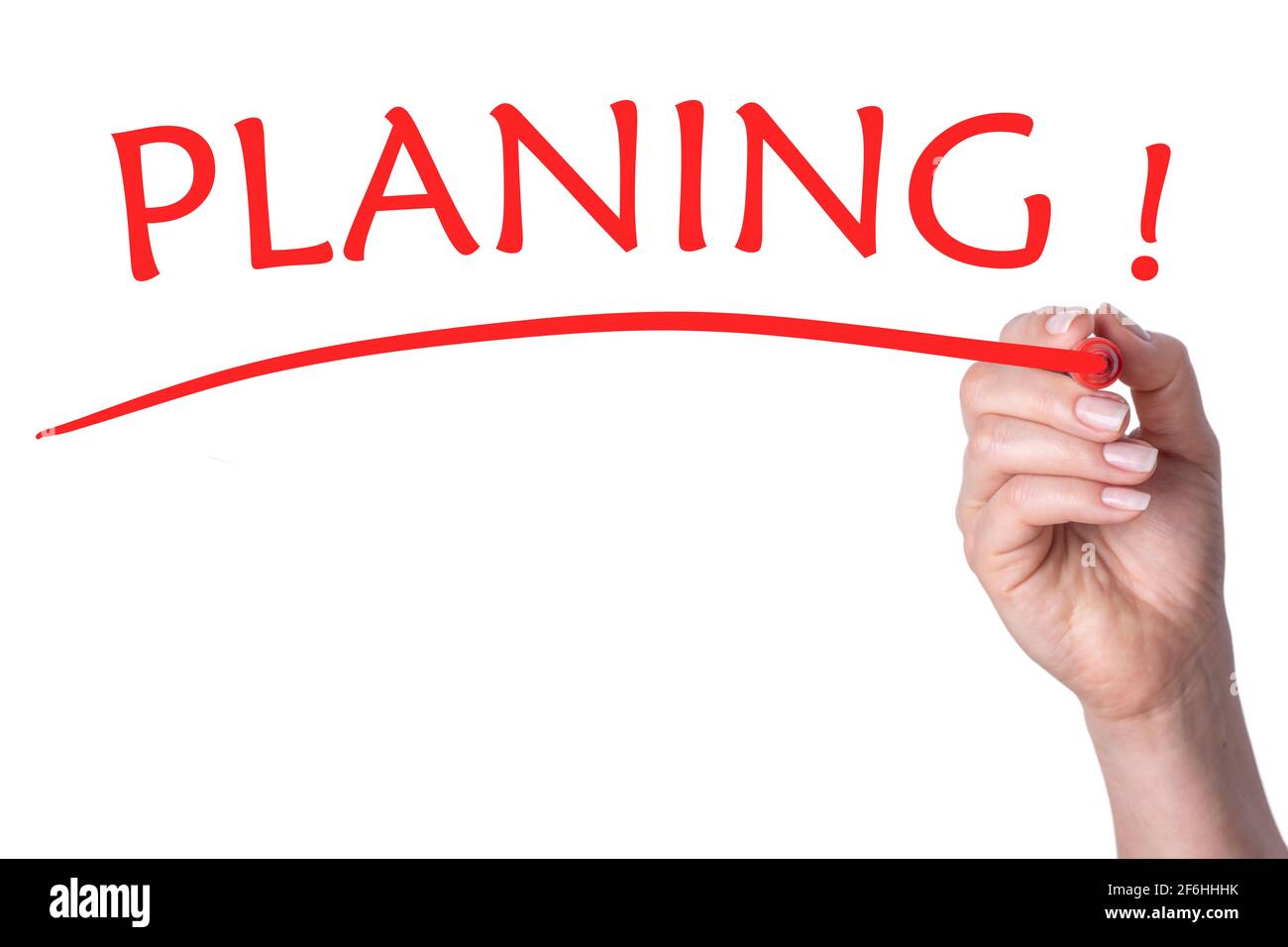 Hand writes word planing with red marker on transparent white ...
